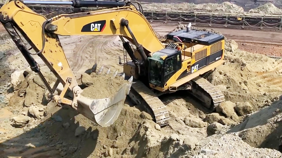 Cat 385C L Excavator Loading Mercedes And Man Trucks - Labrianidis SA